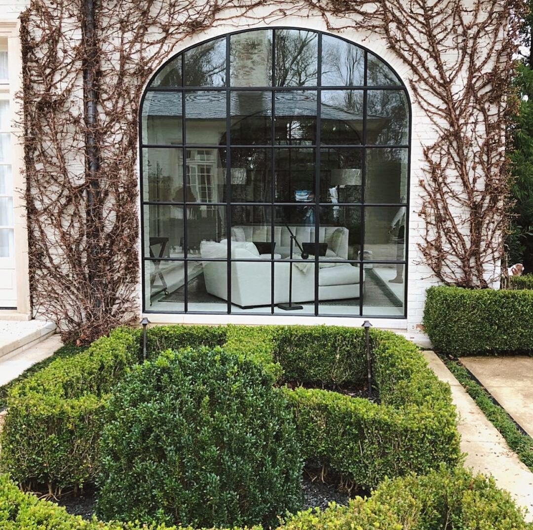 Steel and Glass Arched Windows by Womack Iron